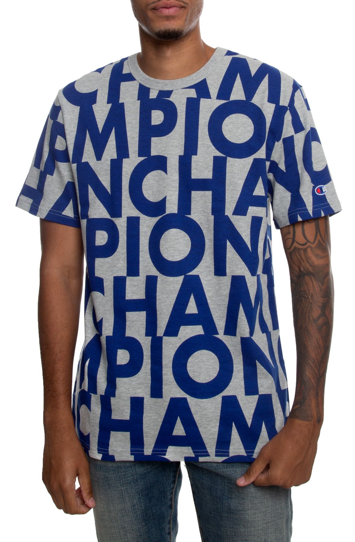 CHAMPION Heritage All-Over Script Short Sleeve Tee T1919S7W+ - Shiekh